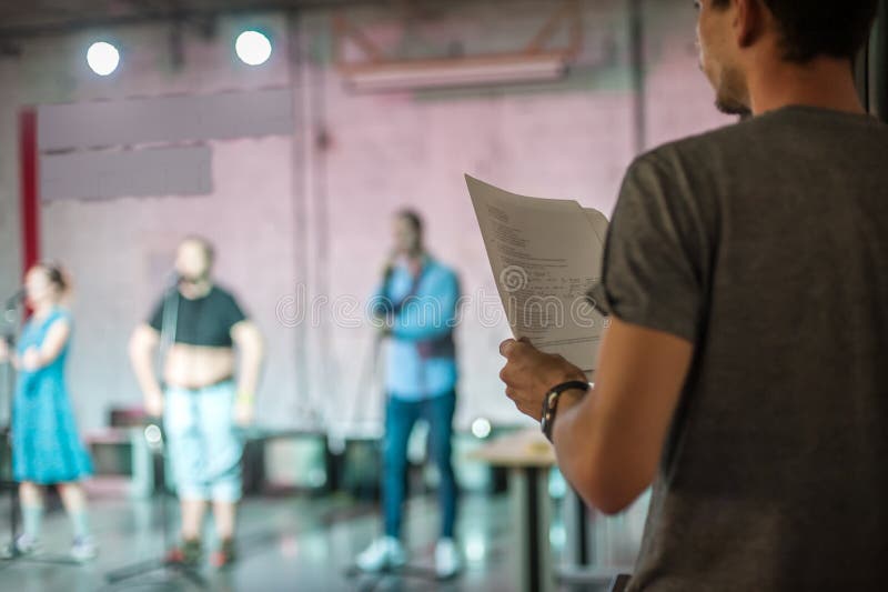 Director Rehearses the Play with Actors According To the Script Stock ...