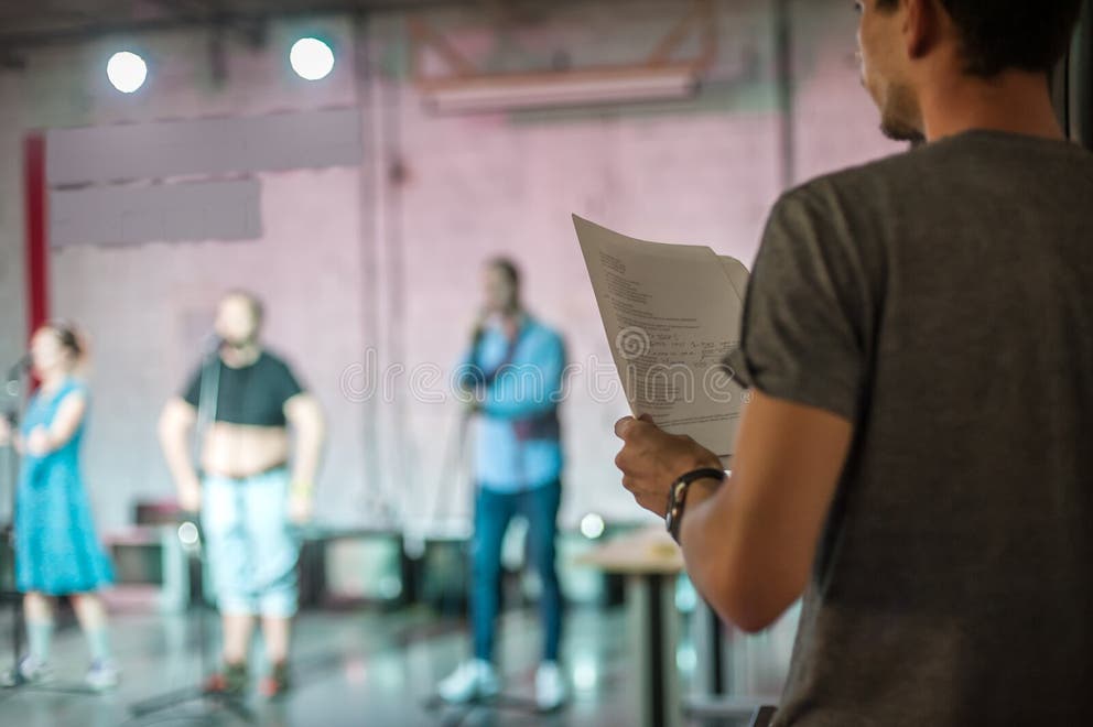 Director Rehearses the Play with Actors According To the Script Stock ...