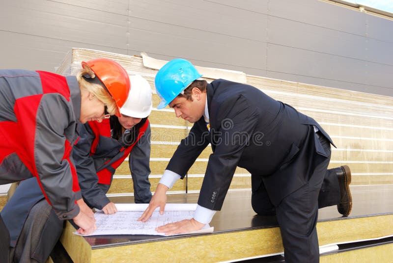 Director with Subordinates on Construction Site Stock Image - Image of ...