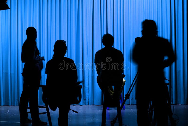 The Directors Blue stock image. Image of silhouettes, stage - 6313379