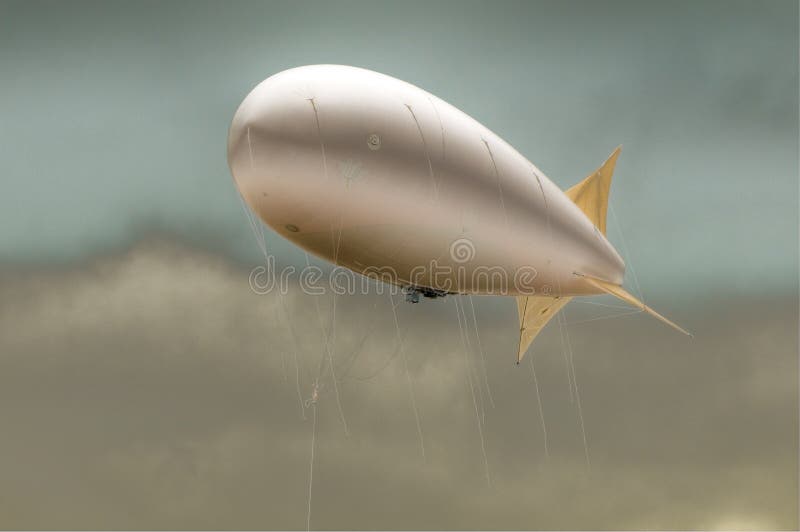 Airship Floating Over Blue Sky Stock Image - Image of inflated ...