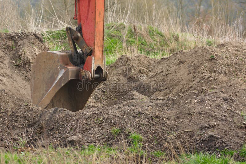 An Excavator Shovel in Closeup at the Excavation Stock Photo - Image of ...