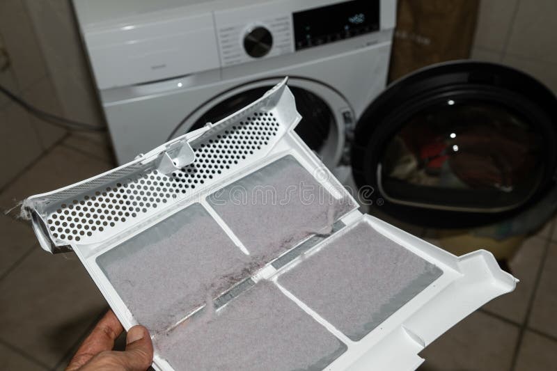 Dirt and Hair Trapped by the Tumble Dryer Filter Stock Image - Image of ...
