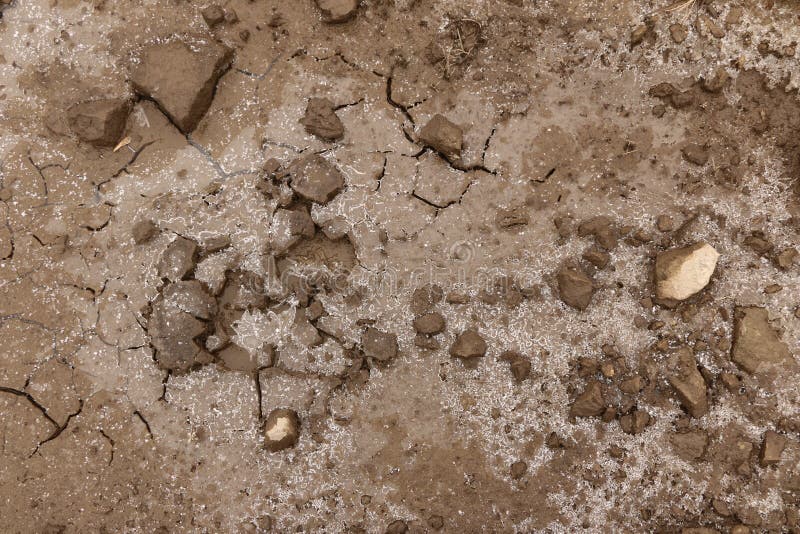 Dirt and Ice with Cracks - Background and Texture Stock Photo - Image ...