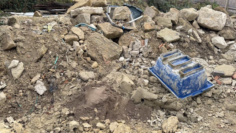 Dirt Pile with Rocks and Blue Tray Stock Photo - Image of litter, dump ...