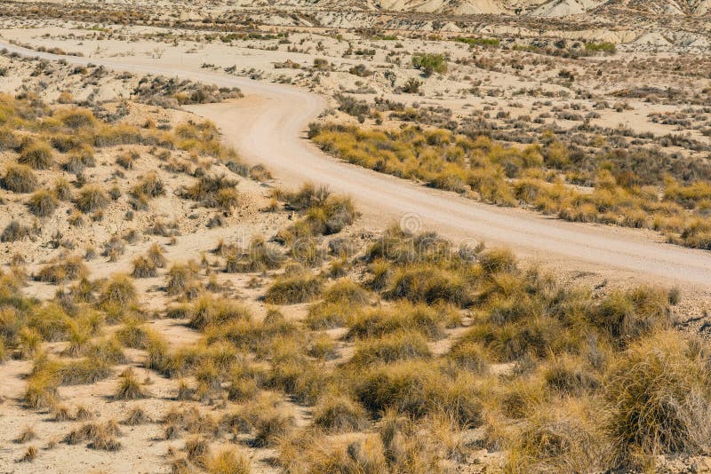 Dirt Road in Arid Desolate Landscape. Stock Image - Image of geology ...