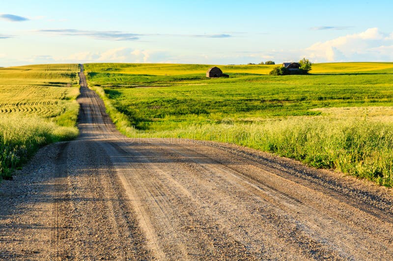 A Dirt Road with a Barn in the Distance Stock Image - Image of sunset ...