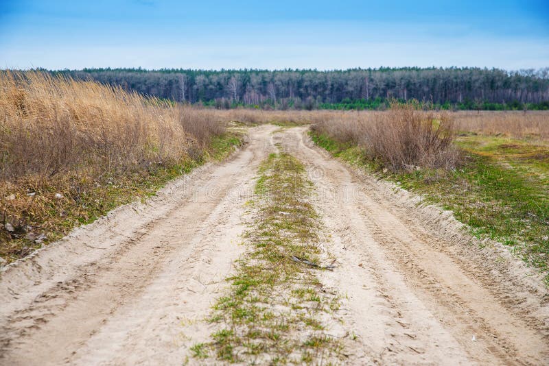 Dirt road in the field stock image. Image of farm, blue - 92593235
