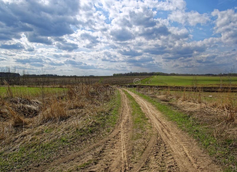Dirt Road through Fields in Spring Stock Photo - Image of path, natural ...