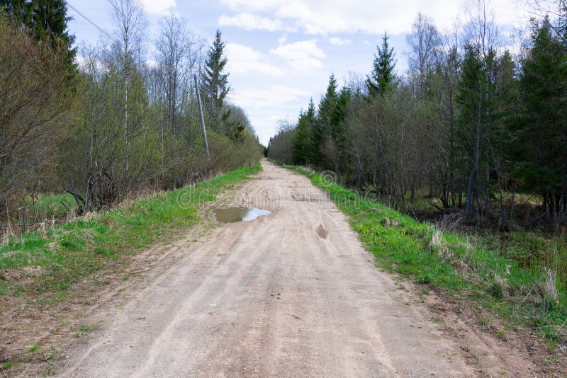 A Dirt Road that Goes into the Distance in the Village. Stock Image ...