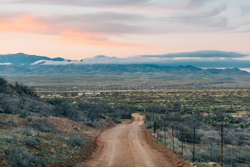 Dirt Road and Mountains at Sunset in the Desert of Eastern Arizona ...