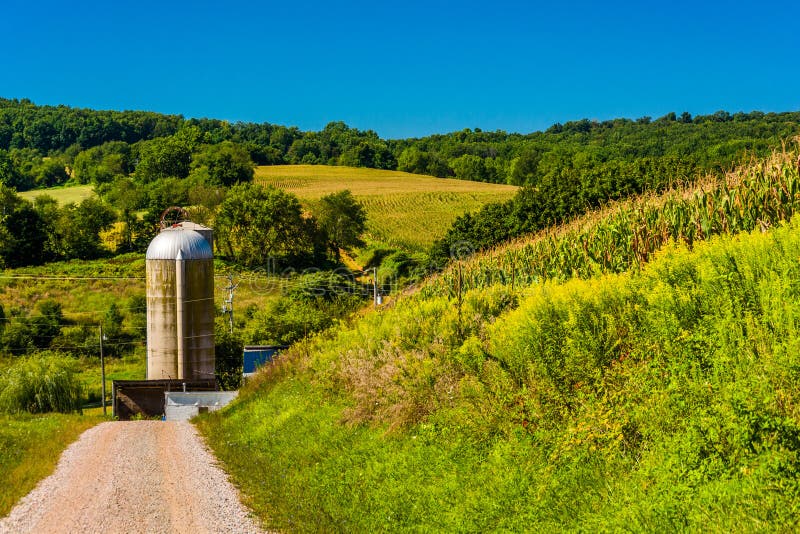 Dirt Road and a Silo in Rural York County, Pennsylvania. Stock Photo ...