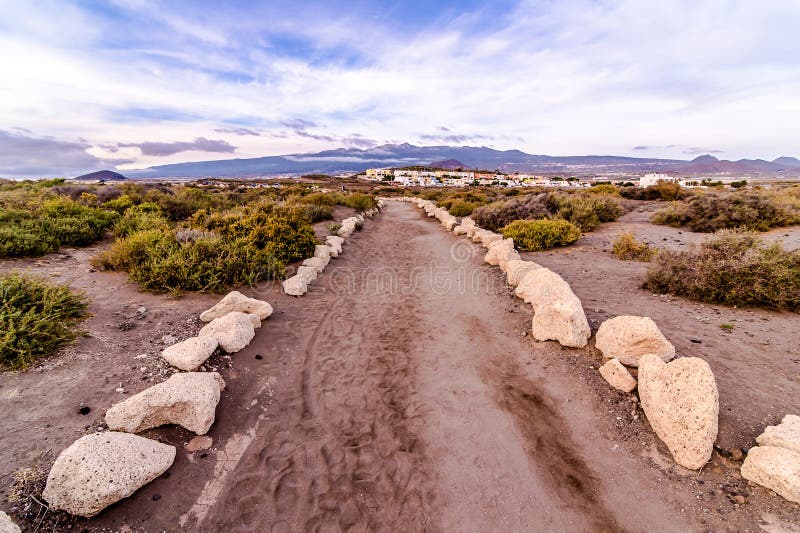 A Dirt Road with a Stone Wall on the Side Stock Image - Image of empty ...