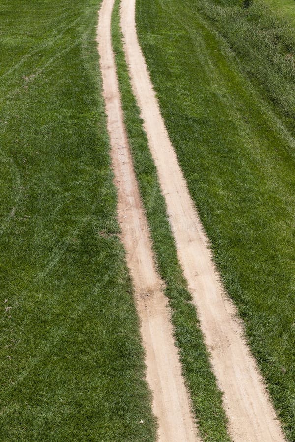 Dirt Road Tracks Grass stock photo. Image of dirt, sand - 27800366
