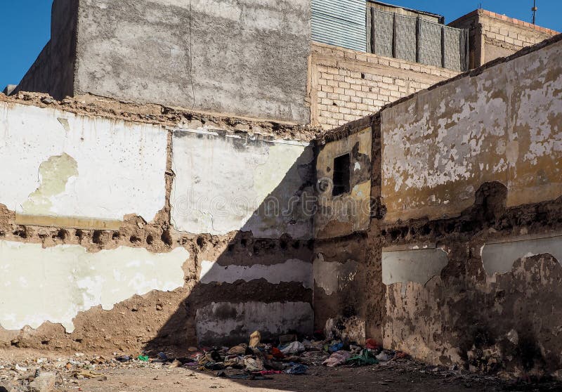 Dirty Bare Walls Visible after Demolished House, Rubbish on the Ground ...