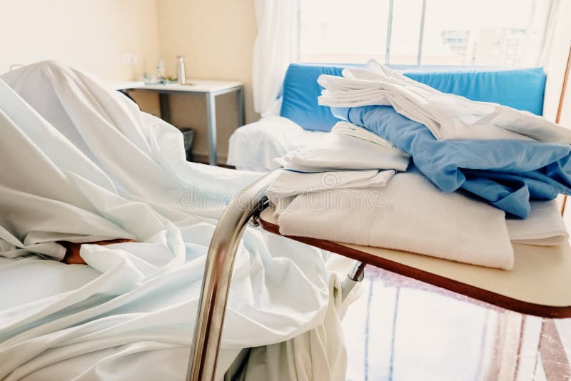 Hospital Room with Plastic Bag Hanging on a Hospital Bed To Collect ...