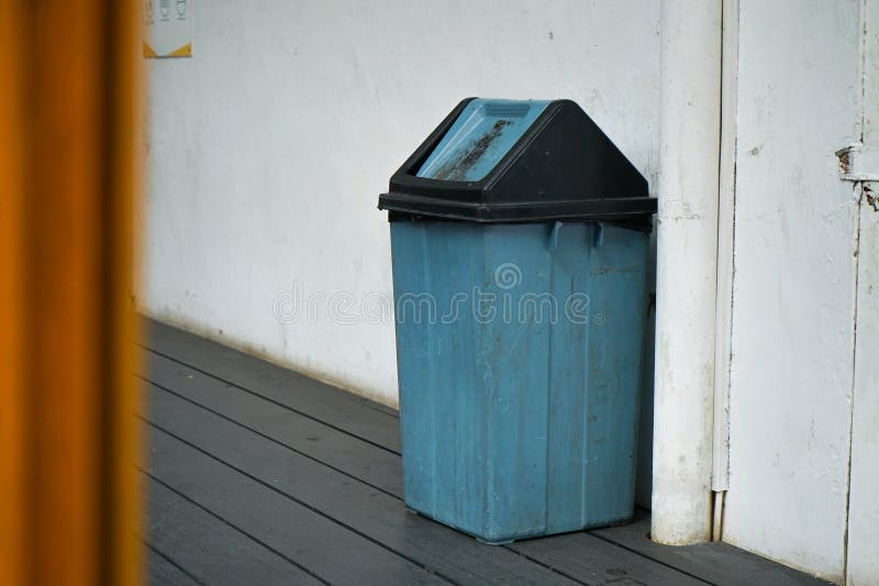 Blue trash can stock image. Image of trash, dirty, clean - 326954599