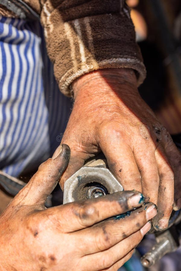 The Calloused Hands of a Working Man with Dark Skin Tell a Story of ...