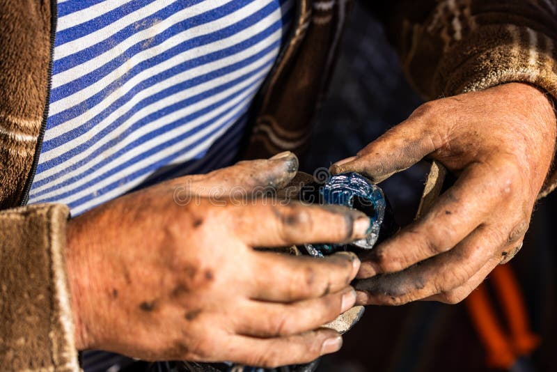 The Calloused Hands of a Working Man with Dark Skin Tell a Story of ...