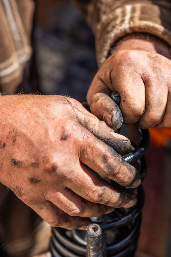 The Calloused Hands of a Working Man with Dark Skin Tell a Story of ...