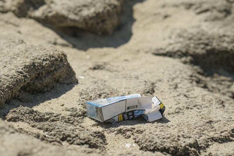 Dirty Cigarette Pack Trash Discarded on Rocky Sea Coast Ecosystem ...