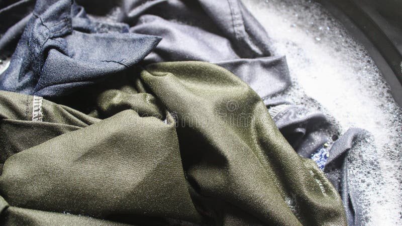 Dirty Clothes Soaked in Detergent Water Stock Photo - Image of dirty ...