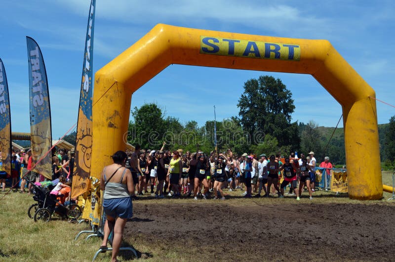 Dirty Dash starting line editorial stock photo. Image of athletes ...