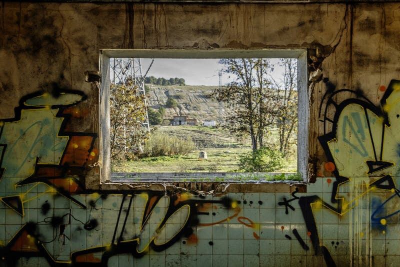 Dirty Defacement on Wall of an Abandoned Building with a Window ...