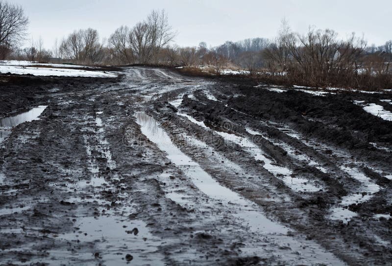 Dirty Dirt Road with Big Ditches Stock Photo - Image of earth, puddles ...