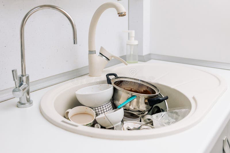Dirty Dishes in Kitchen after Lunch in the Kitchen Sink. Mess in the ...