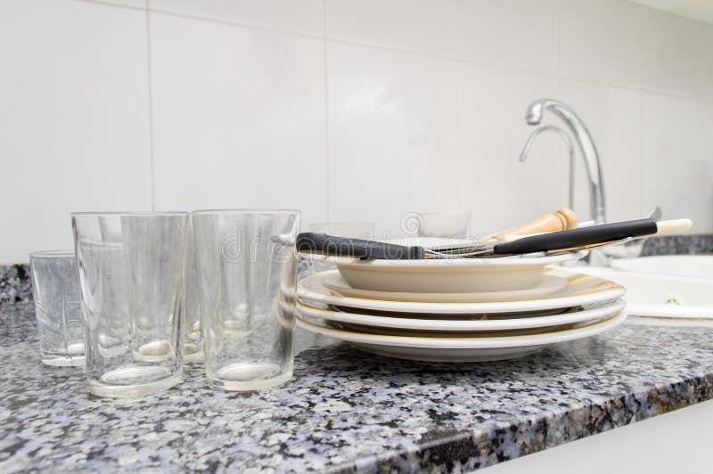 Stack Of Dirty Dishes And Silverware By Sink Stock Photo - Image of ...