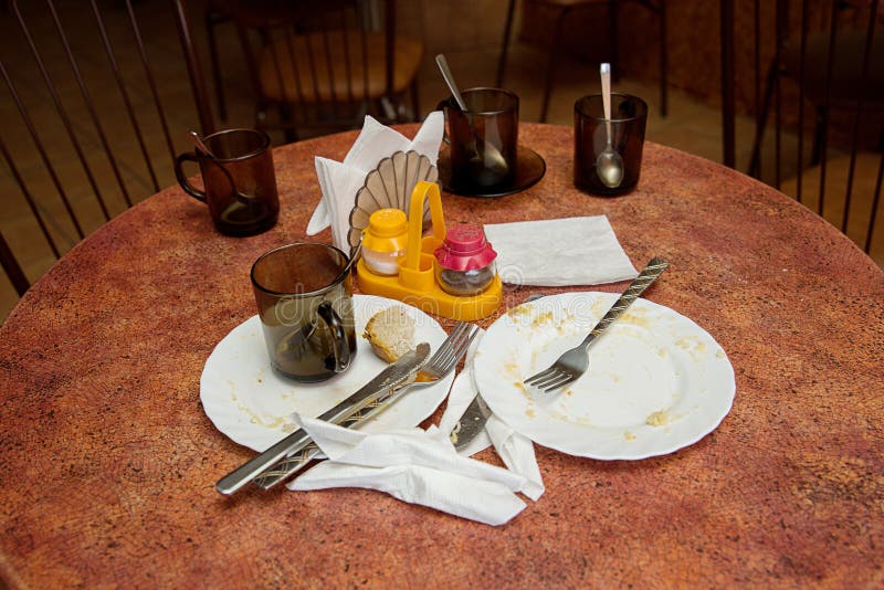 Dirty Dishes On A Table In A Restaurant Stock Photo - Image of crumbs ...