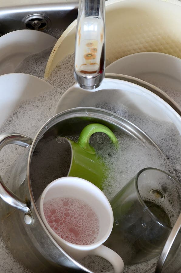 Unwashed Kitchen Utensils and Dishes in the Sink Stock Photo - Image of ...