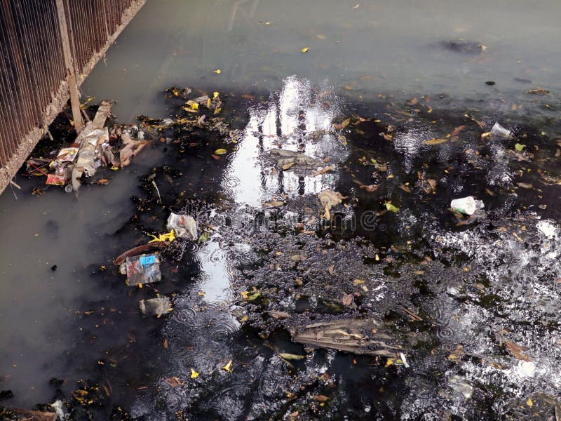 Dirty Drains Full of Rubbish and Black Water Editorial Photography ...
