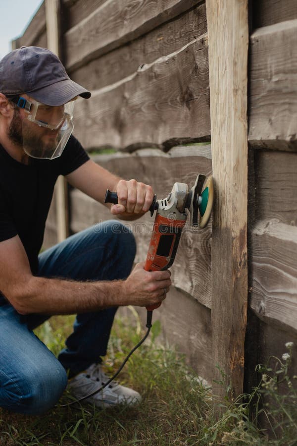 Dirty and Dusty Work with a Sanding Disc on Wood Stock Photo - Image of ...