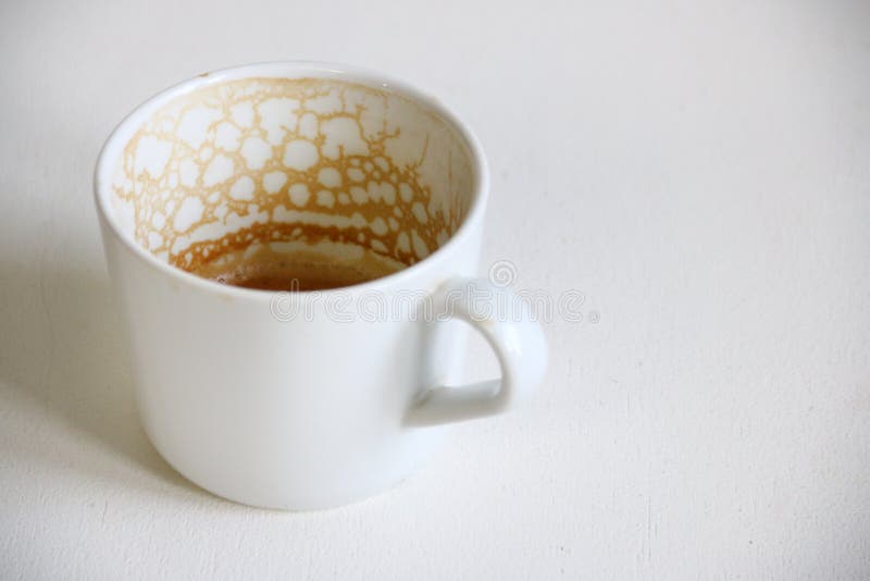 Dirty Empty Coffee Cup Closeup on White Table. Top View Empty and Dirty ...