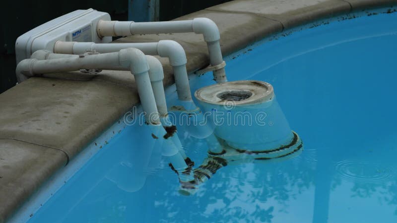 Dirty Swimming Pool with Trash and Leaves on the Surface of the Water ...