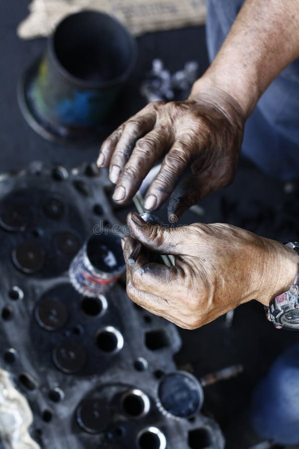 Man& X27;s Hands, Oiling and Greasing Valves Stock Photo - Image of ...