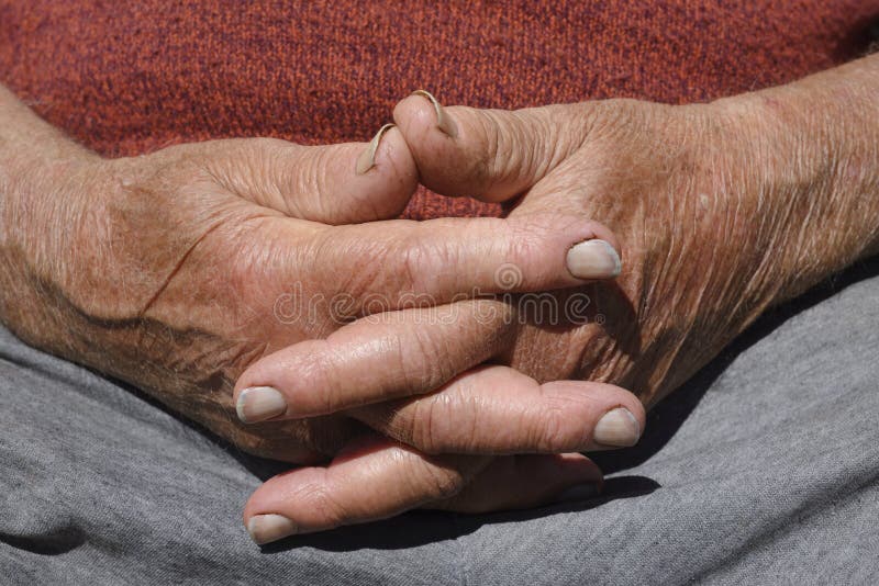 Hands of a farmer at rest stock image. Image of hair - 245251487