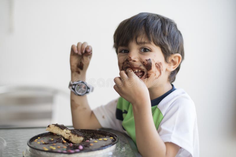 Dirty Kid Eating Chocolate Pie Stock Photo - Image of dinner, goodies ...
