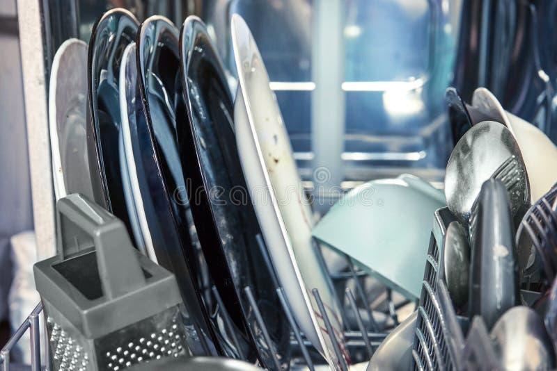 Dirty Kitchen Item Post Folded into the Dishwasher Stock Photo - Image ...