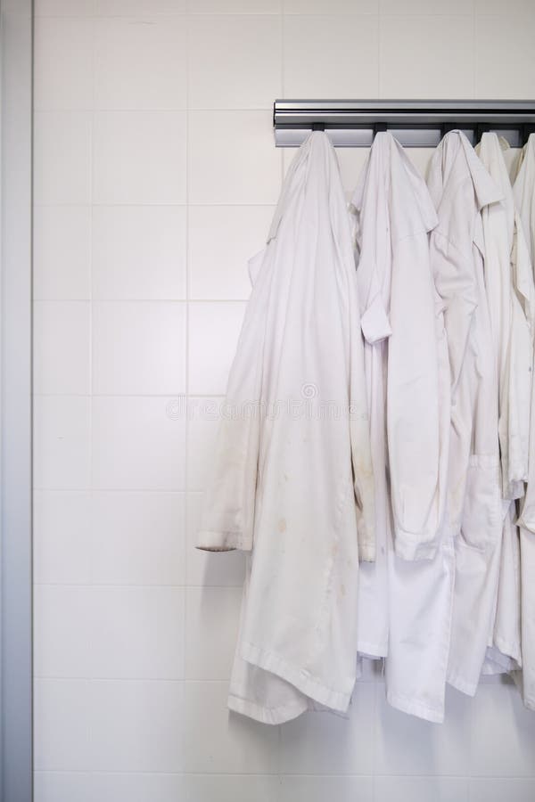 Dirty Lab Coats Hanging in a Laboratory Stock Photo - Image of hang ...