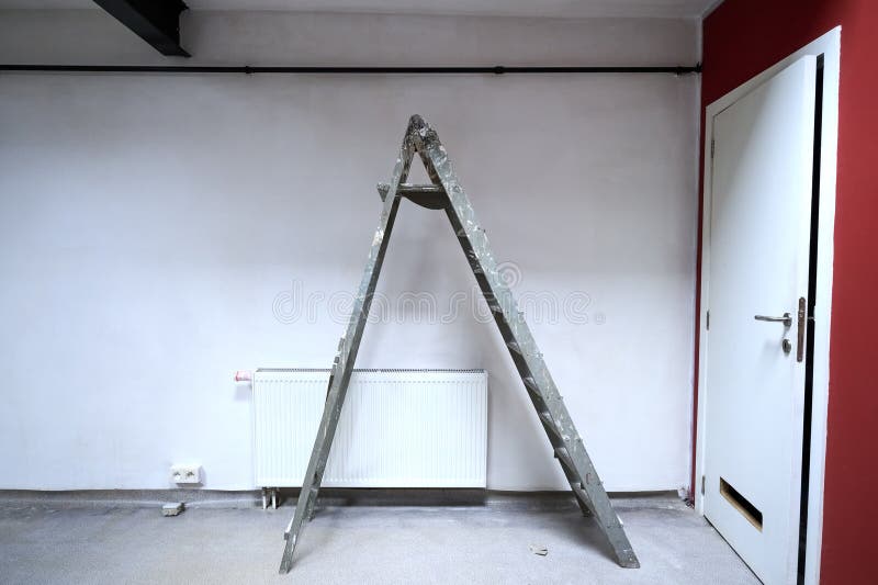 Dirty Ladder in Front on a Wall for Renovation Stock Photo - Image of ...