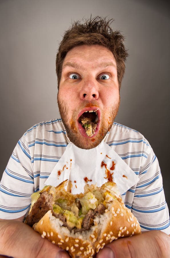 Dirty Man Chewing Hamburger Stock Photo - Image of humour, dining: 19390586