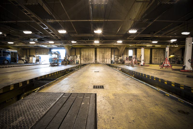 Dirty, Oily Bus Garage Inspection Pit Stock Photo - Image of dark ...