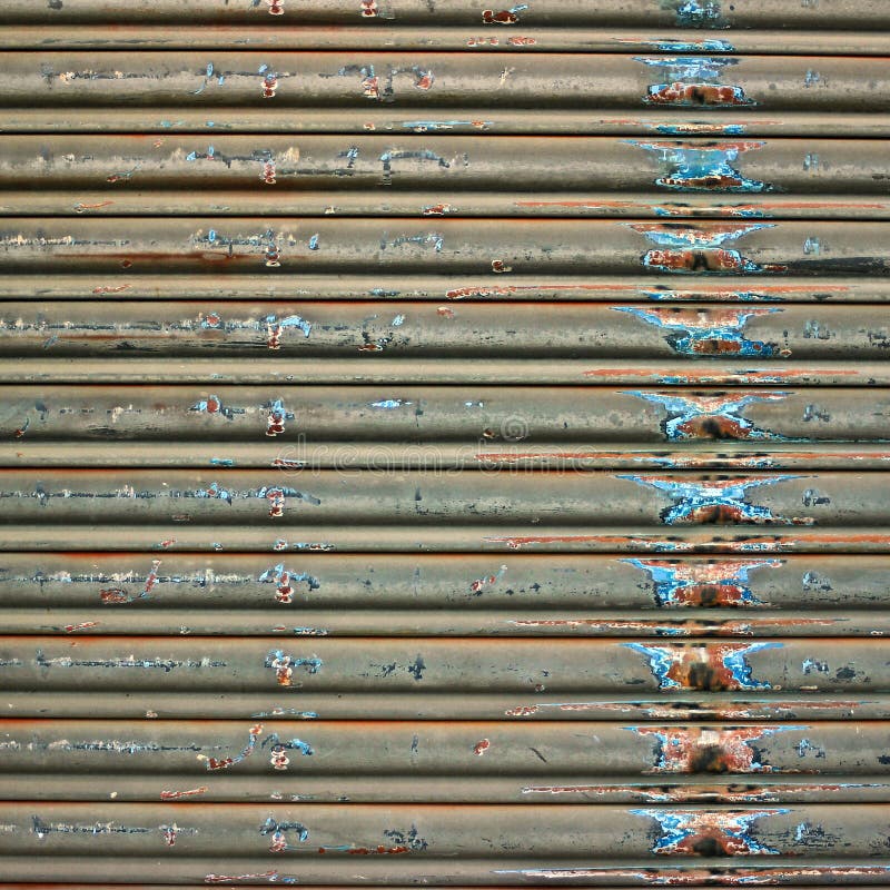 Dirty Old Shop Shutter that Has Seen Better Days. Stock Image - Image ...