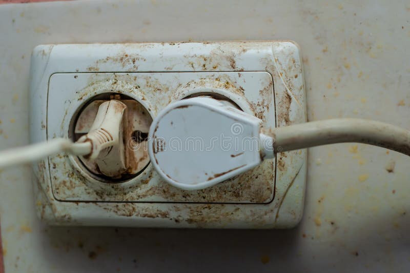 Dirty Outlet in Dirt and Grease from a Stove with Connected Electrical ...