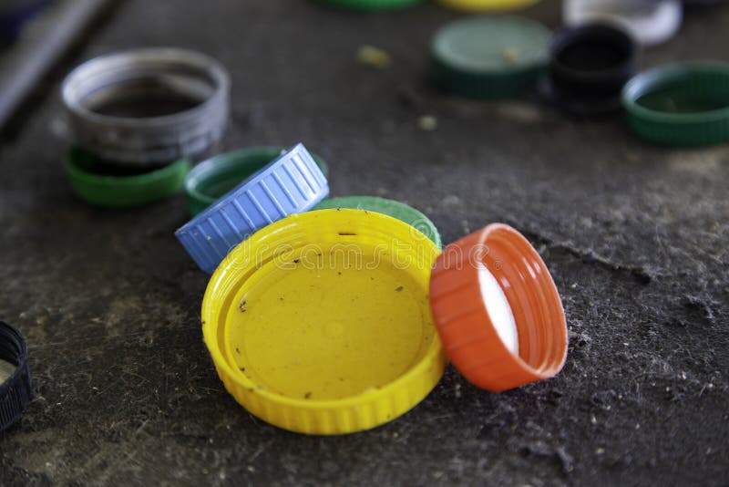 Dirty plastic caps stock image. Image of contamination - 255312519