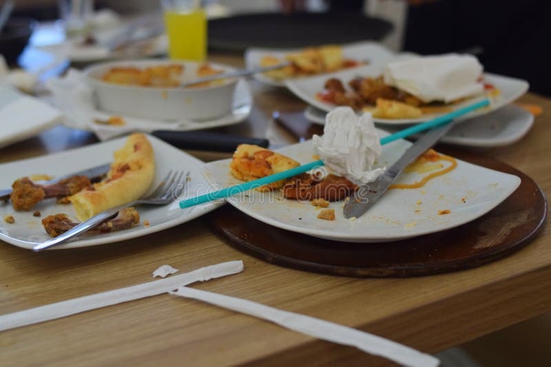 Dirty Plates after Eating with Scrap Food. Empty Dish after Eating ...