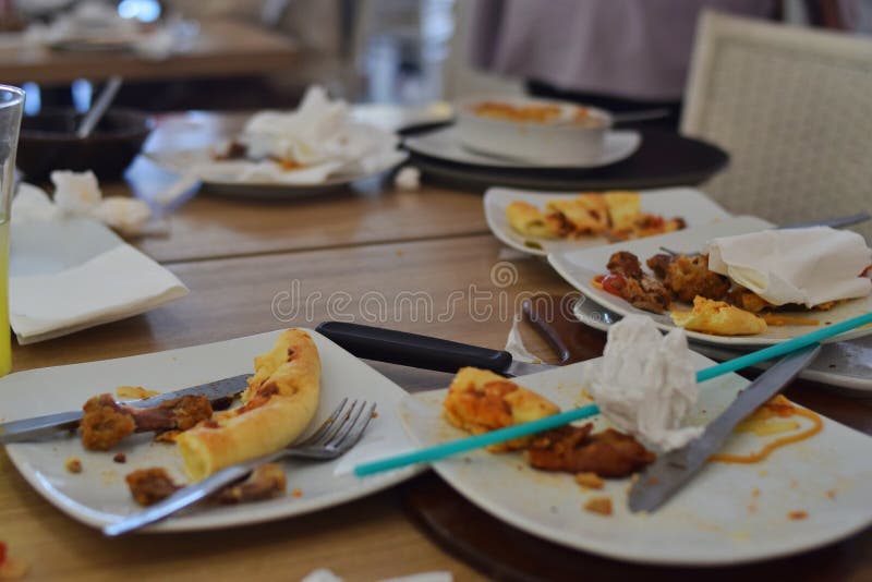 Dirty Plates after Eating with Scrap Food. Empty Dish after Eating ...